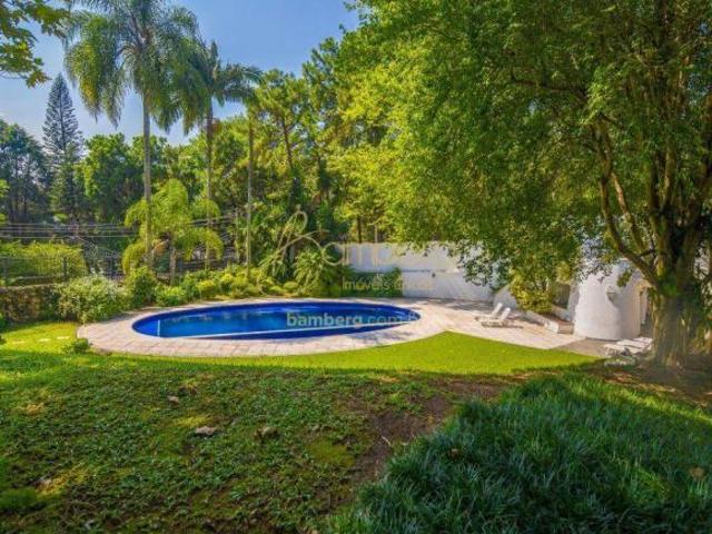 CASA NO CONDOMÍNIO CHÁCARA FLORA JARDIM PISCINA ESPAÇO GOURMET 5 SUITES 10 VAGAS