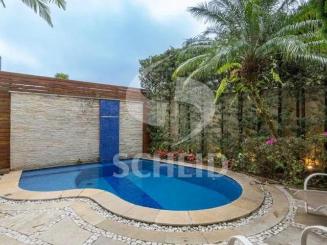 Casa no condomínio América para venda com 4 quartos, sendo 4 suítes, 383m²