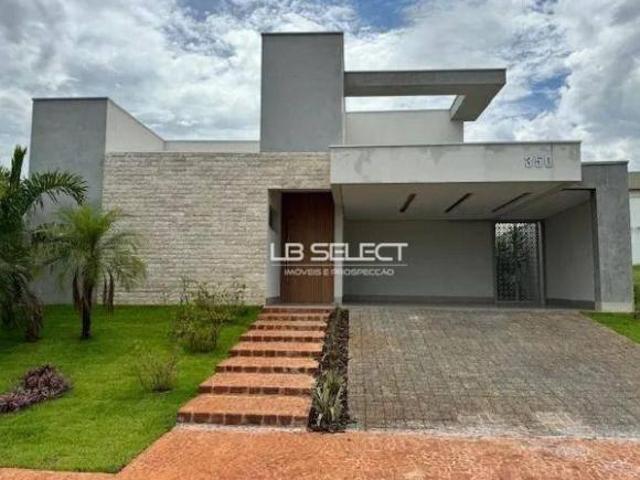 Casa no Condomínio Alphaville I com quatro quartos, três suítes e área gourmet completa