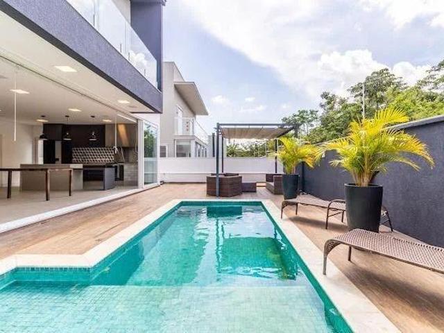 Casa no condomínio Alphaville Nova Esplanada: 4 quartos, 4 suítes, 3 salas, 5 banheiros, 4 vagas, 36