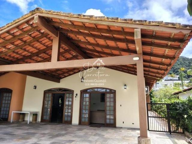 Casa no condomínio Granville 4 suítes, 2 salas, 806,4 m2 de área, 6 vagas de garagem no Guarujá SP