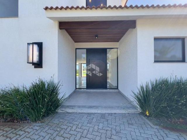 Casa no Condomínio Green Village em Xangri lá à venda, com 3 quartos/dormitórios, 2 vagas/box, no co