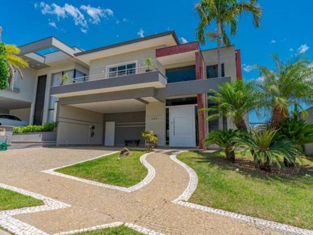 Casa no condomínio Swiss Park para venda com 5 quartos, sendo 4 suítes, 404m²