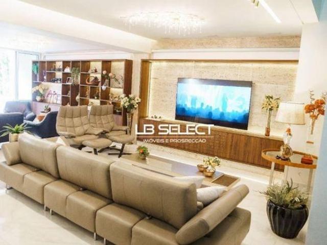 Casa no Condomínio Reserva do Vale com quatro suítes e varanda gourmet completa
