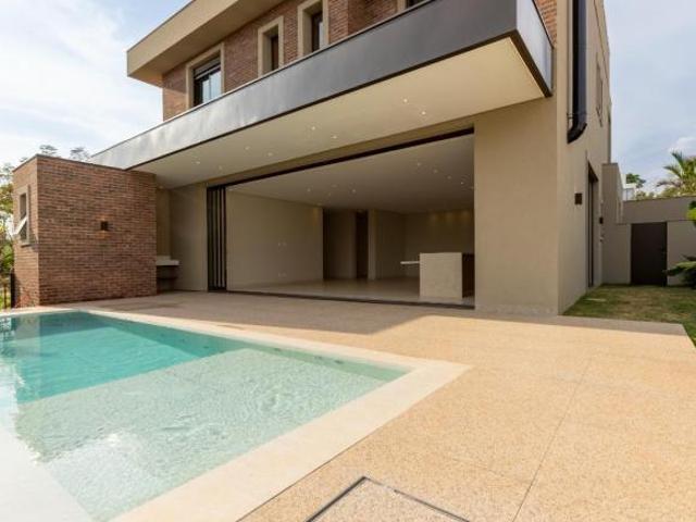 Casa no condomínio Reserva Santa Luísa para venda com 4 quartos, sendo 4 suítes, 424m²