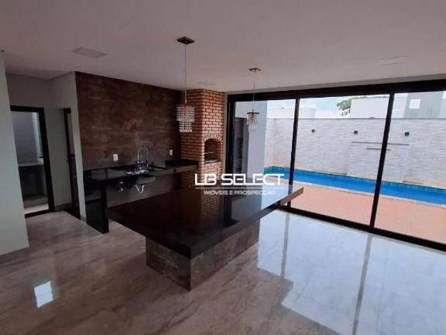 Casa no Condomínio Varandas Sul com cinco quartos e varanda gourmet