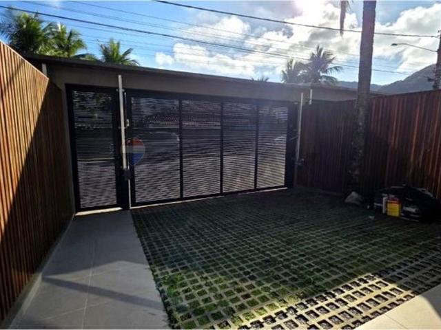 Casa nova com 4 suítes a 400 metros da praia em Juquehy para locação anual