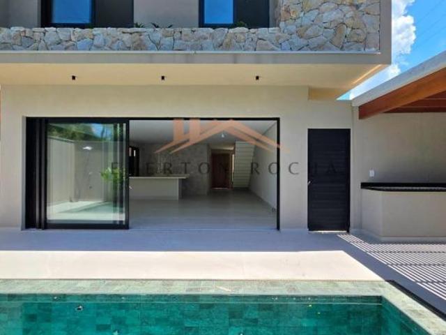 Casa nova com 4 suítes, espaço gourmet e piscina Condomínio a poucos passos do mar