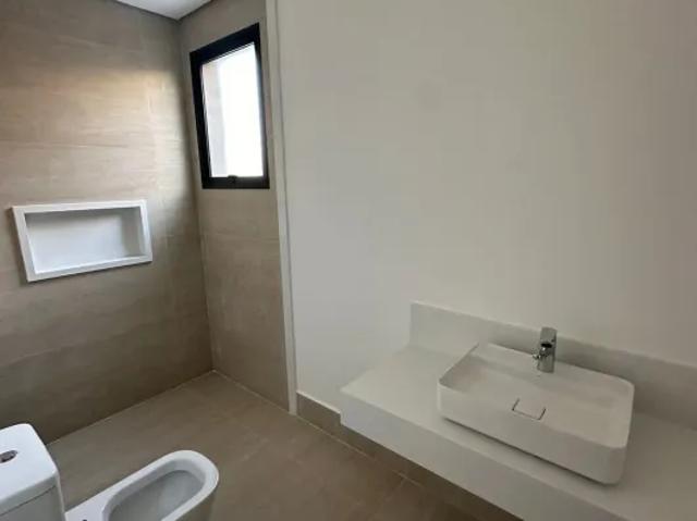 Casa nova a venda tem 439 m² com 4 suítes com closet em Alphaville Gênesis II