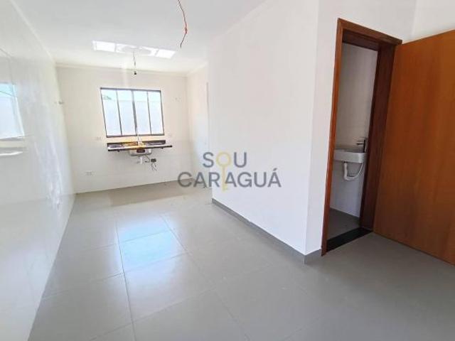 Casa Nova a venda com quintal perto da praia Massaguaçu em Caraguatatuba