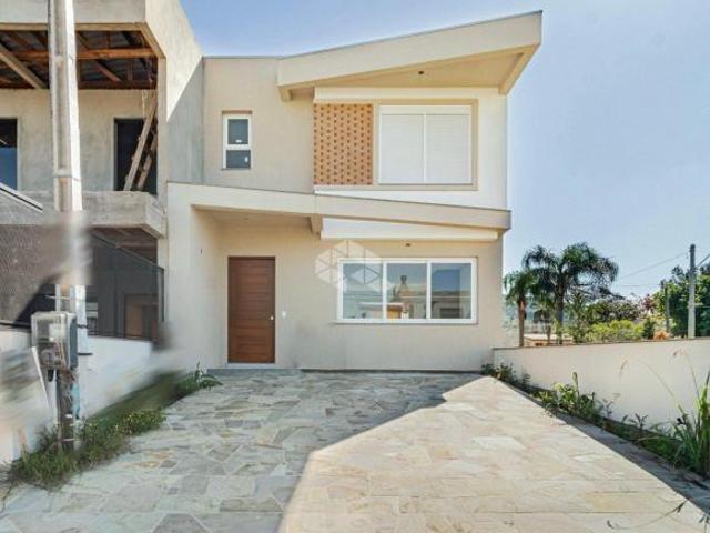 CASA NOVA DE 3 DORMITÓRIOS, PÁTIO E 2 VAGAS NA ZONA SUL