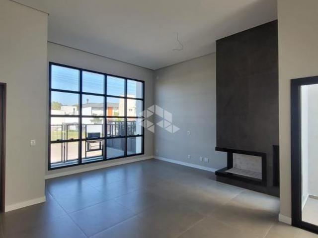 Casa Nova de Alto Padrão à venda com 3 suítes no Terras de Santorini Camobi Santa Maria/RS