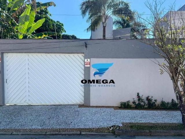 Casa nova e reformada à venda na praia da Enseada no Guarujá I Omega Imoveis