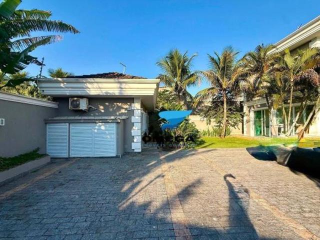 Casa nova e reformada à venda na praia da Enseada no Guarujá I Omega Imoveis