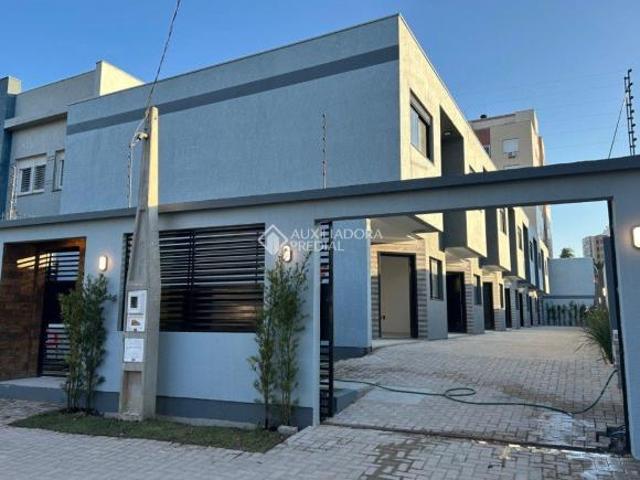 Casa nova em condomínio com 3 dormitórios, suíte e churrasqueira excelente localização!