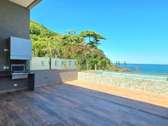 Casa nova pé na areia com 280m² pé direito duplo, 5 suítes e piscina