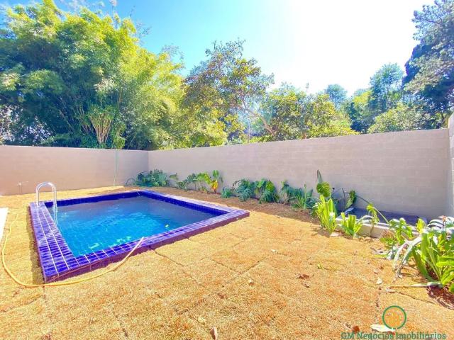 Casa nova térrea com 3 suítes quintal com piscina em condomínio