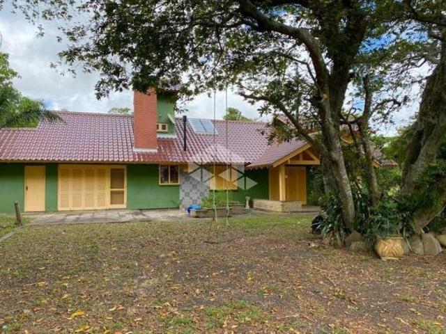 Casa a Beira da Lagoa no Litoral Norte do RS