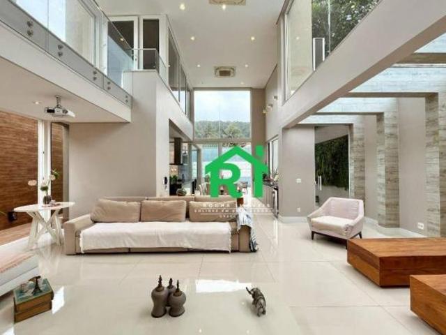 Casa à beira mar com 4 quartos 4 suítes, 2 vagas e lazer em Jardim Guaiuba, Guarujá