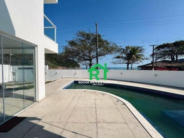 Casa à beira mar com 4 quartos 4 suítes, 6 vagas e lazer à venda em Jardim Guaiuba, Guarujá