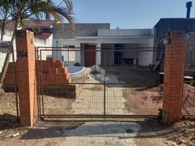 Casa a venda 02 dormitórios, sendo um suíte com closet, escritório,, churrasqueira, piscina