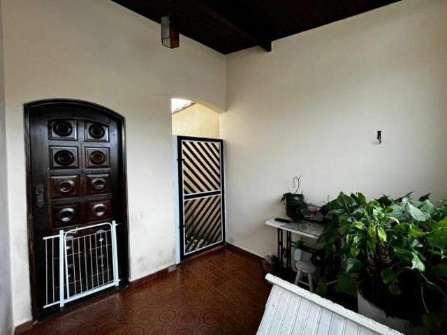 Casa à venda no Caiçara Praia Grande com 2 quartos, 1 suíte e 5 vagas