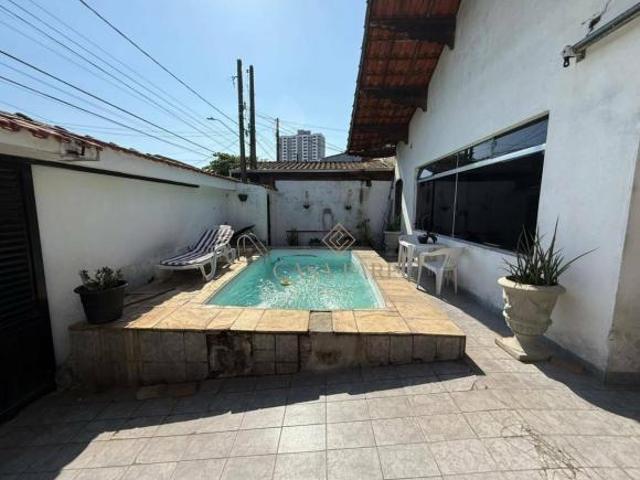 Casa com 3 dormitórios à venda, 132 m² por R$ 1.200.000,00 Boqueirão Praia Grande/SP