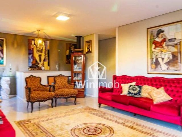 Casa com 3 dormitórios à venda, 262 m² por R$ 1.246.000,00 Condomínio Cantegril Viamão/RS