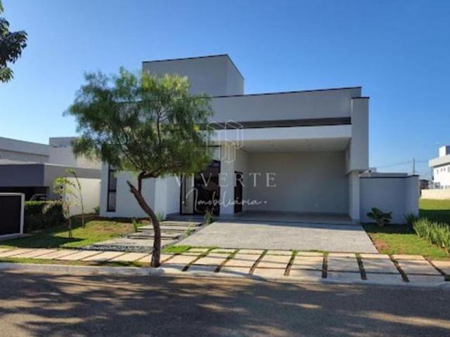 Casa com 3 dormitórios à venda, 285 m² por R$ 2.300.000,00 Condomínio Evidence Residencial Araço