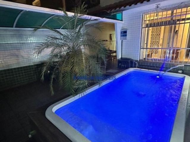 Casa a venda 2 quartos quintal piscina Ponta da Praia Santos/SP