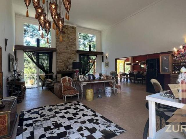 Casa com 4 dormitórios à venda, 315 m² por R$ 4.300.000,00 Condomínio Recanto do Sol Campos do J