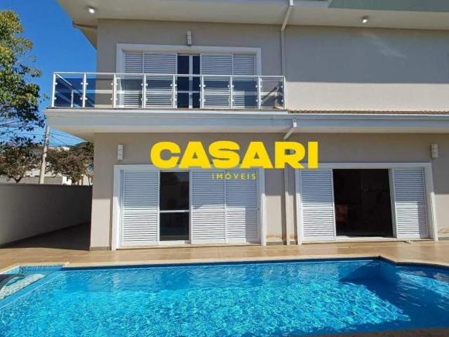 Casa à venda, 432 m² com 5 dormitórios, piscina aquecida, no condomínio Flora Vi