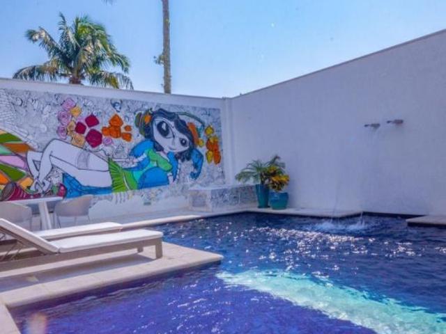 Casa com 5 dormitórios à venda, 488 m² por R$ 3.850.000,00 Acapulco Guarujá/SP
