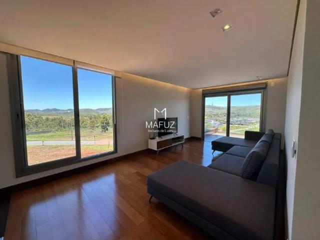 Casa contemporânea com 4 suítes, piscina de borda infinita e vista para a lagoa dos ingleses a venda