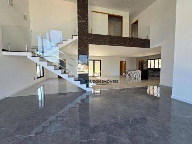 CASA A VENDA, 4 QUARTOS, 1.035M²A.T, 390M²A.C, R$ 3.100.000.00, CONDOMÍNIO TERRA CAXAMBU, CAXAMBU