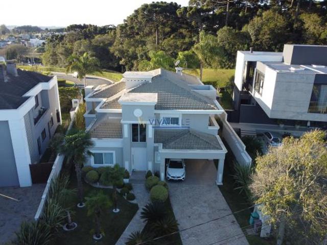 Casa a venda, 5 dormitórios com piscina, fundos