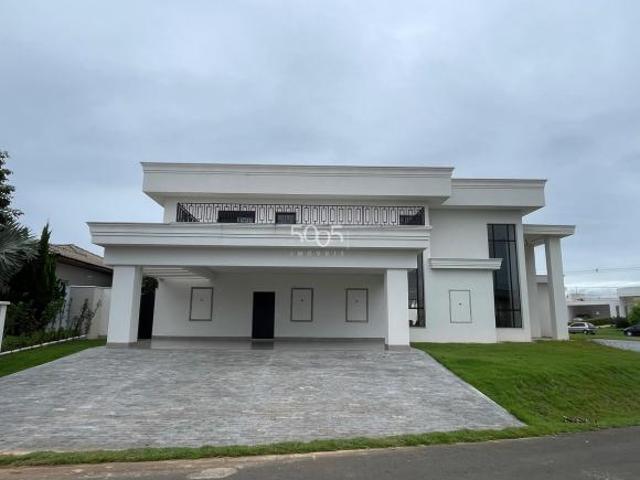 Casa à venda, 6 suítes, terreno amplo de esquina, 580m2 de construção e 1461m2 de terreno no condomí