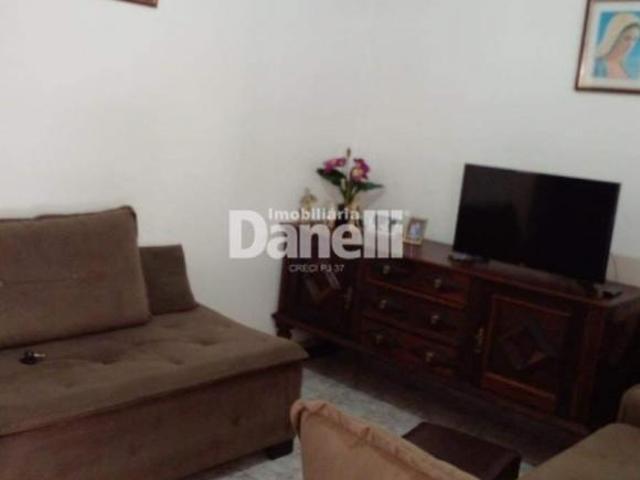 Casa a venda com casa nos fundos