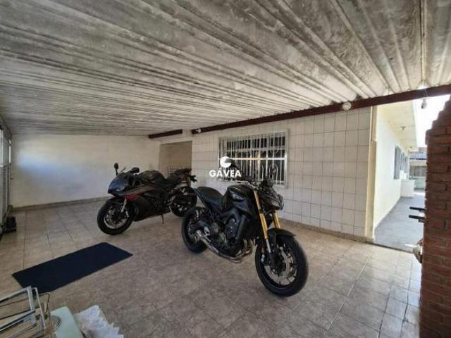 Casa à venda com edícula no Bairro Jockey Club São Vicente/SP