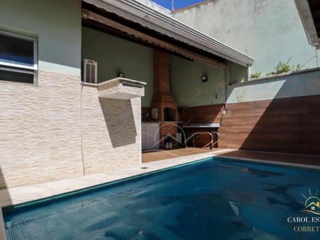 Casa à venda com piscina, 3 Quartos sendo 2 suítes, 4 banheiros, Stella Maris Peruíbe SP