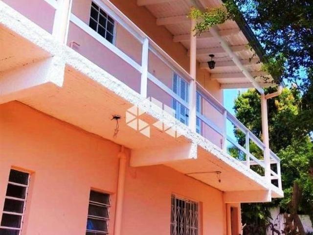 Casa à venda,com 05 dormitórios/quartos, 2 vagas/box coberta em Porto Alegre/RS
