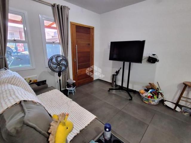 Casa a venda com 2 dormitórios sendo um suite, banheiro, sala cozinha, edicula, garagem coberta