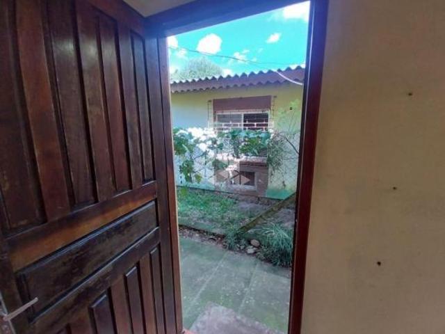 Casa à venda com 3 dormitórios, 2 vagas no bairro Alegria em Guaíba