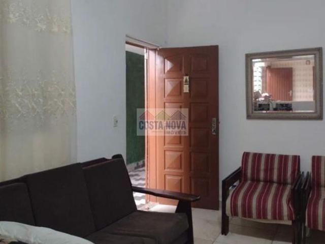 Casa a venda com 3 quartos, 3 banheirso e 2 vagas de garagem na Mirim em Praia Grande SP