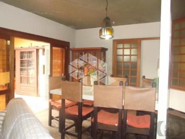 Casa à venda com 3 quartos e suíte no bairro Nonoai
