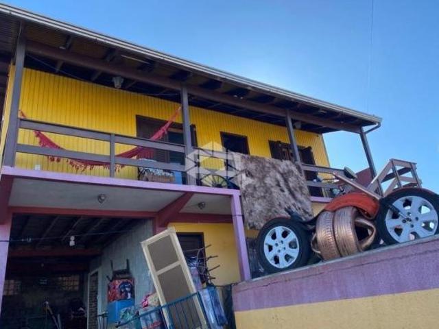 Casa à venda com 4 dormitórios, 2 vagas, Santo Antônio, Caxias do Sul, RS