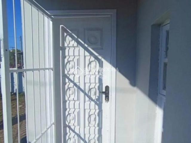 Casa à venda, com 4 dormitórios, no bairro Guajuviras, Canoas