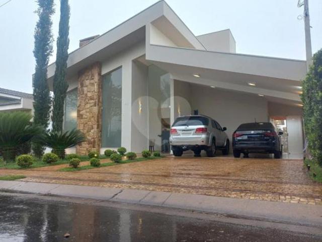 Casa à venda com 4 suítes no condomínio Swiss Park, São Carlos