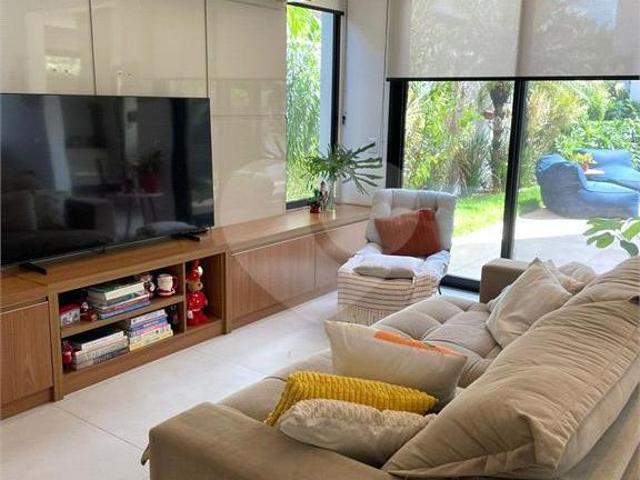 Casa à venda com 4 suítes no condomínio Parque Faber IV, São Carlos