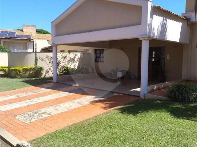 Casa à venda com 4 suítes no condomínio Parque Sabará, São Carlos